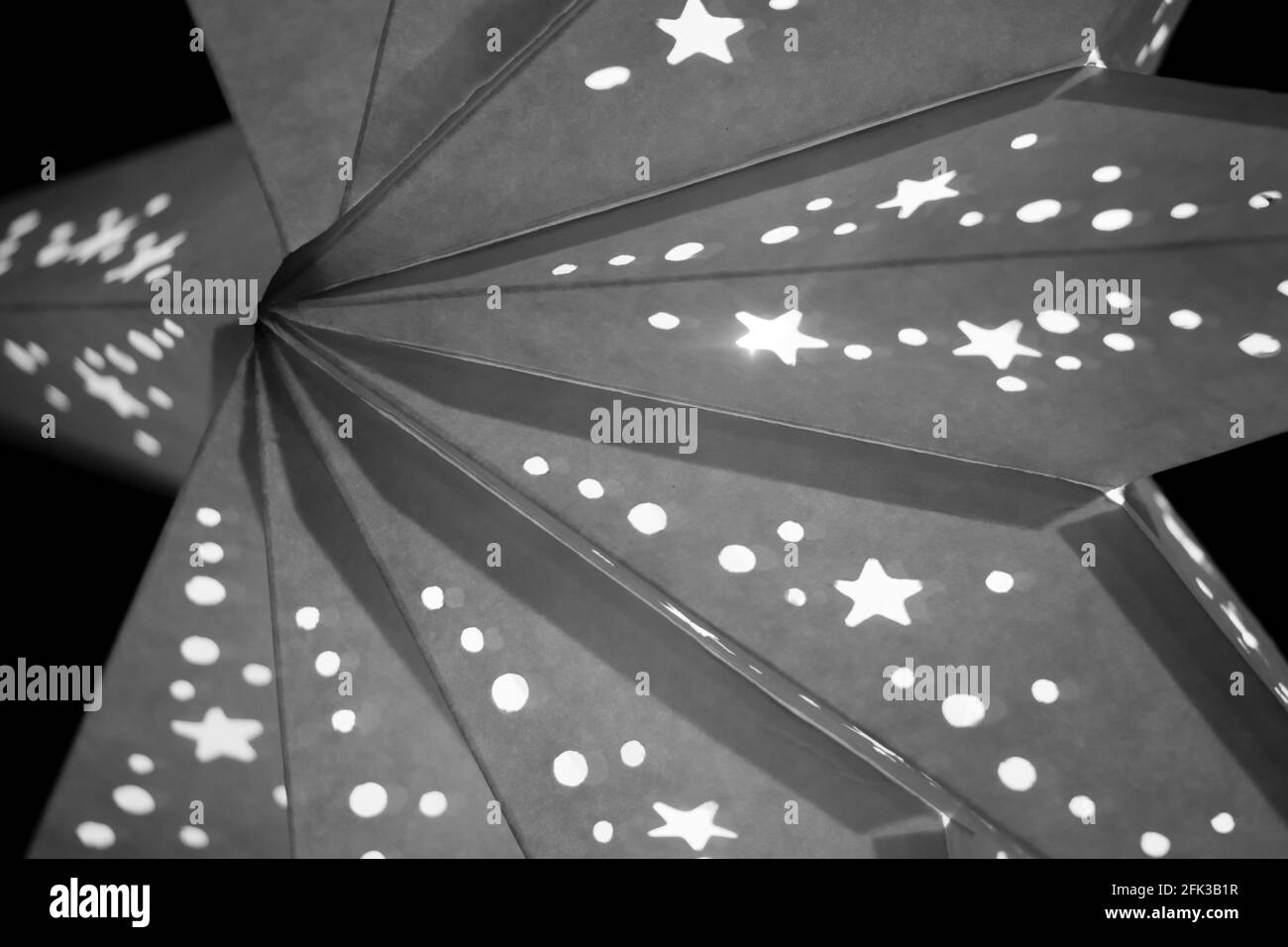 Black and white xmas lantern star at christmas market season. Beautiful ...