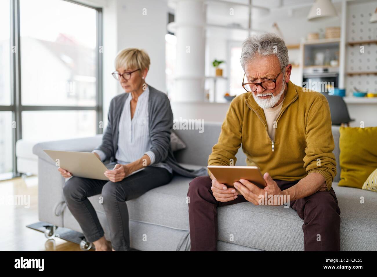 Senior retired couple learn about computer and online support Stock ...