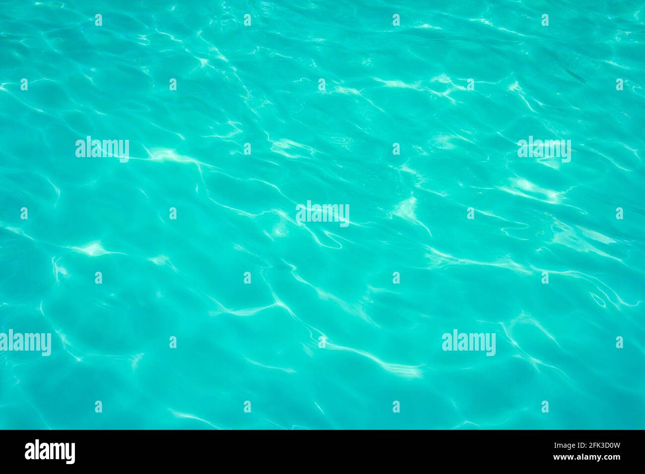 swimming pool with sunny reflections background Stock Photo - Alamy