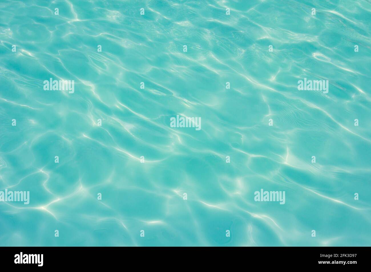 swimming pool with sunny reflections background Stock Photo - Alamy