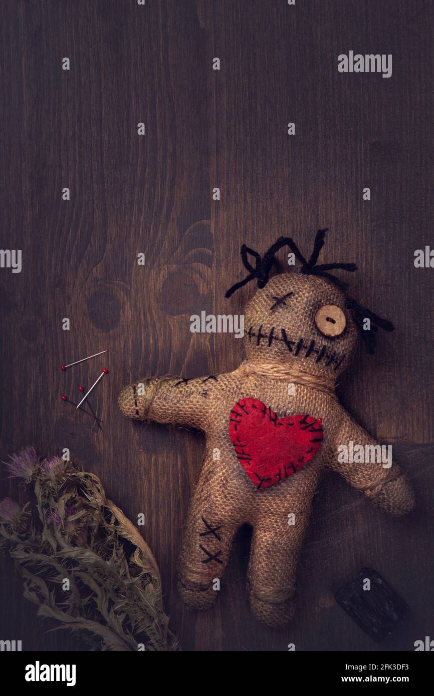 Voodoo doll with pins hi-res stock photography and images - Alamy