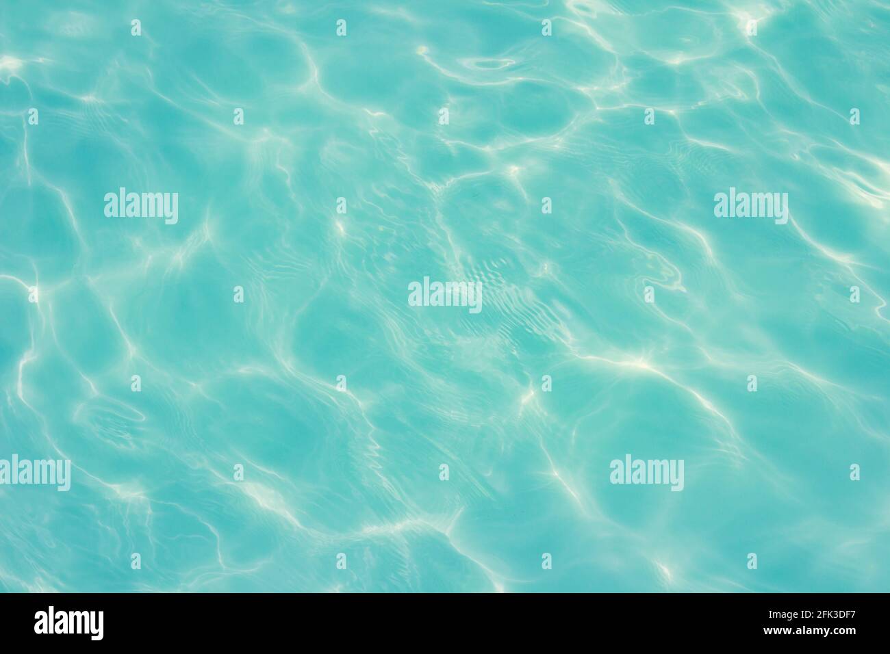 swimming pool with sunny reflections background Stock Photo - Alamy