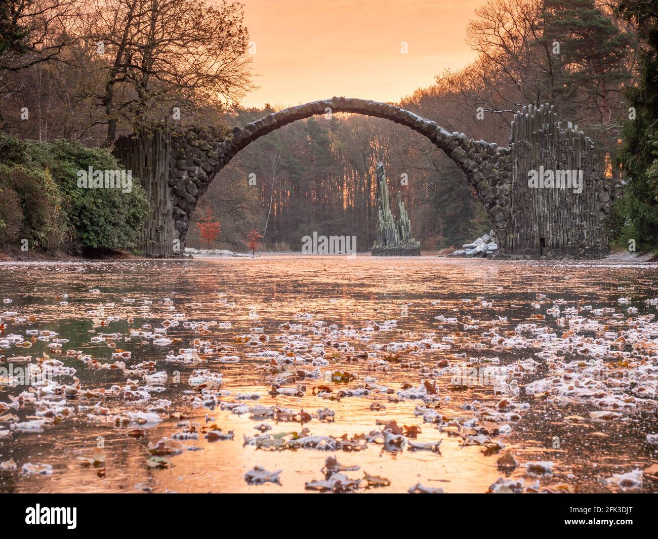 Winter night end at Rakotzbrucke also known as Devils Bridge in Kromlau. Amazing place in ...