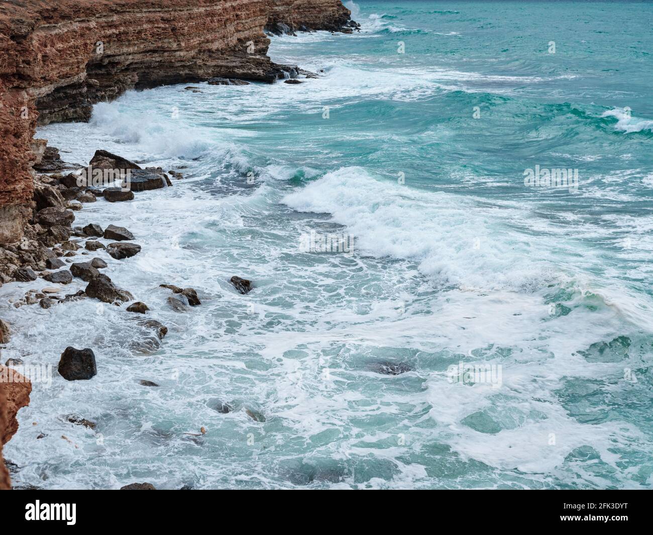 Beautiful view of ocean waves and a fantastic rocky shore, Sea patterns ...