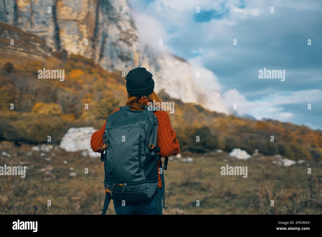 travel tourism woman with backpack high mountains sky landscape Stock ...