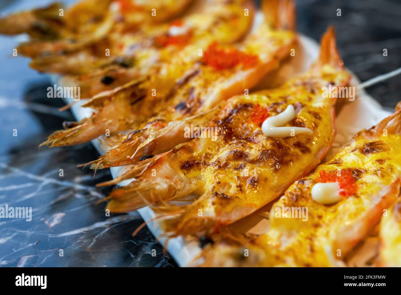 A delicious Japanese dish, grilled prawns with cheese Stock Photo - Alamy