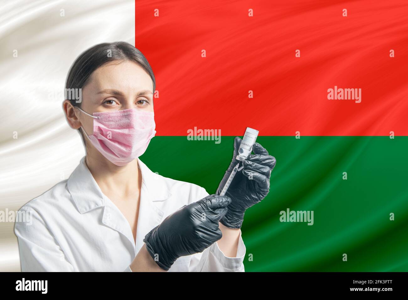 Girl doctor prepares vaccination against the background of the ...