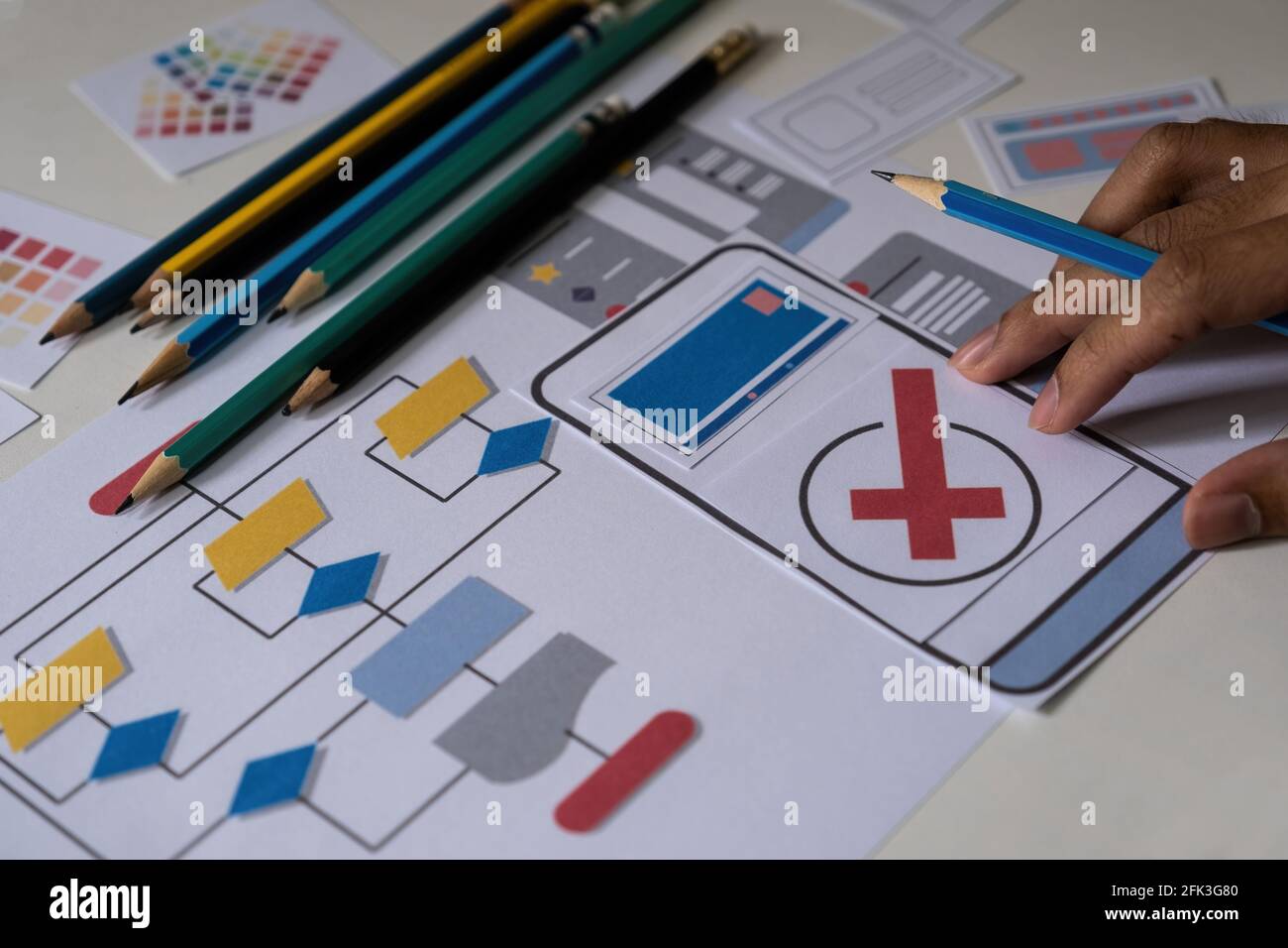 Designers drawing mobile ux app development concept. Man hold pencil ...