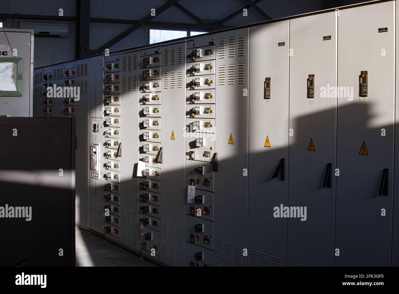 Control room of mining and processing plant. Electric cabinet closeup ...