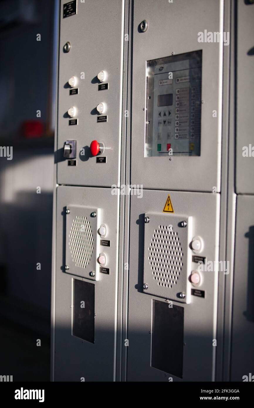 Electric cabinet closeup photo in light and shadow. Electricity counter ...