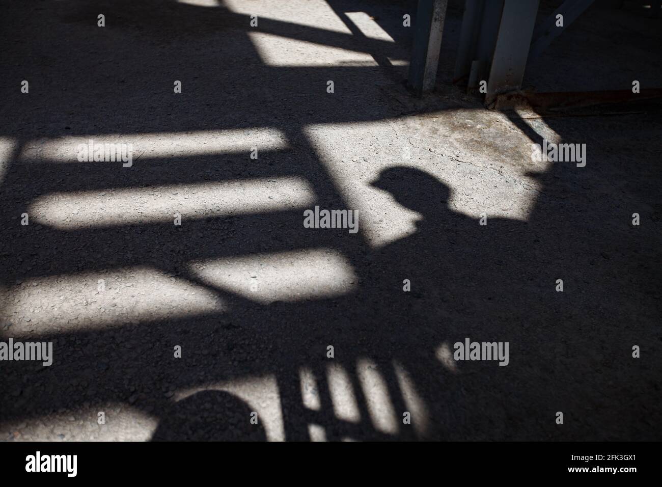 Abstract industrial background. Shadow of stair and worker on textured ...