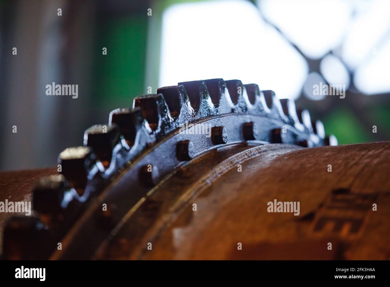 Close-up of gear teeth of ball mill (dressing mill). Gold ore ...