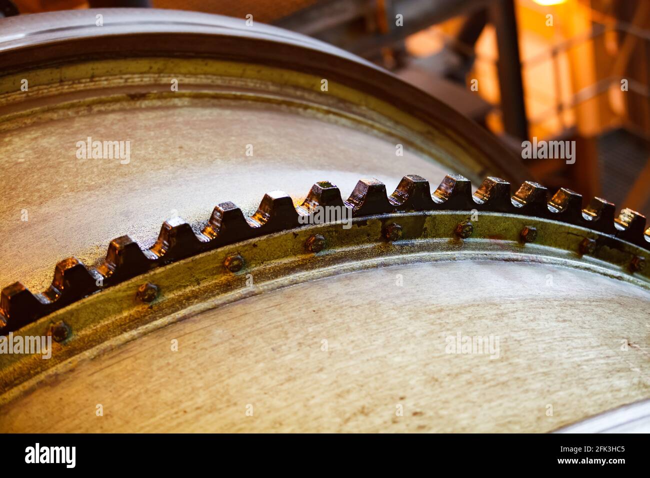 Close-up of gear teeth of ball mill (dressing mill). Gold ore ...
