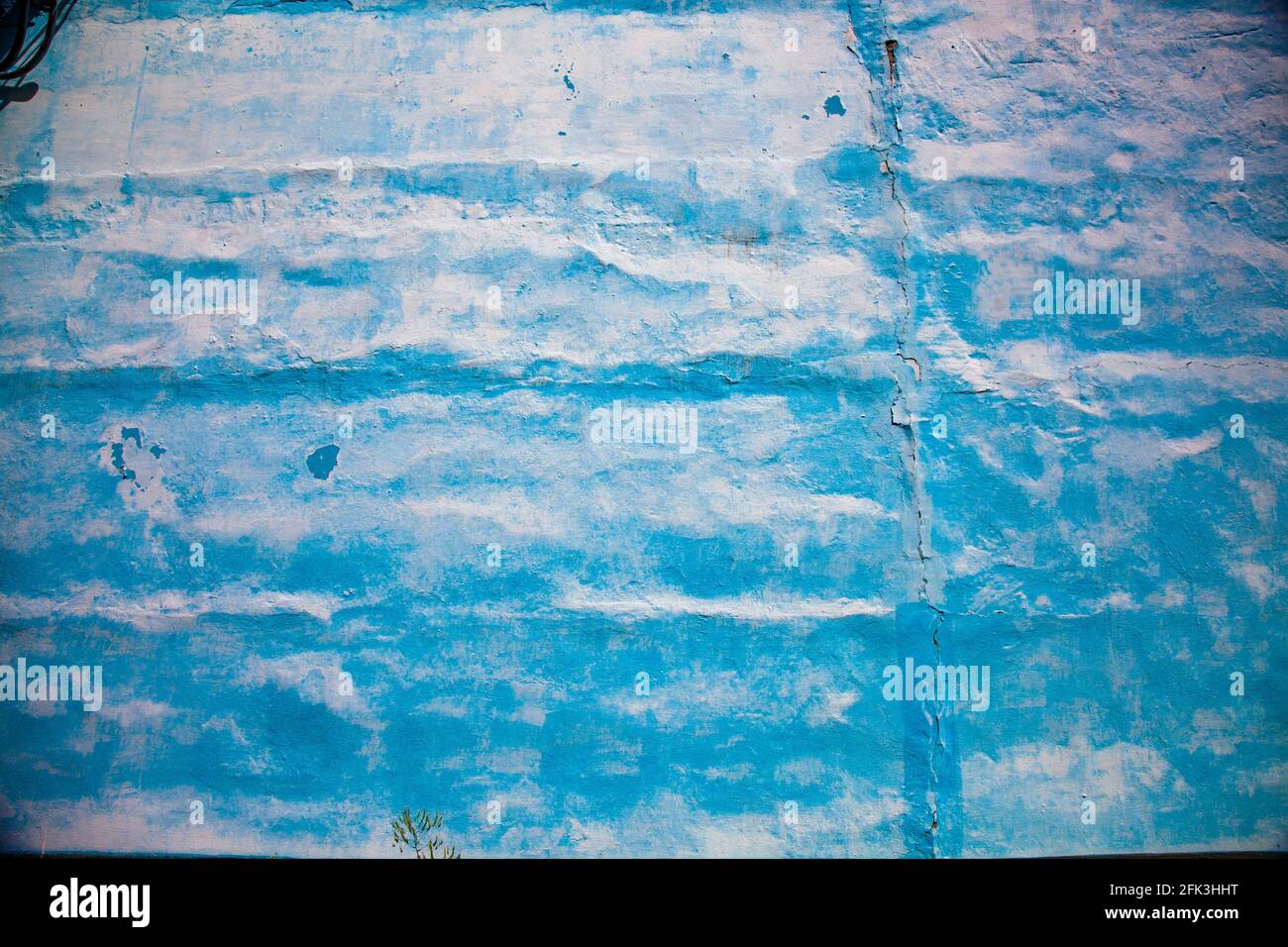 Vintage painted factory wall close-up. Blue and white. Abstract ...