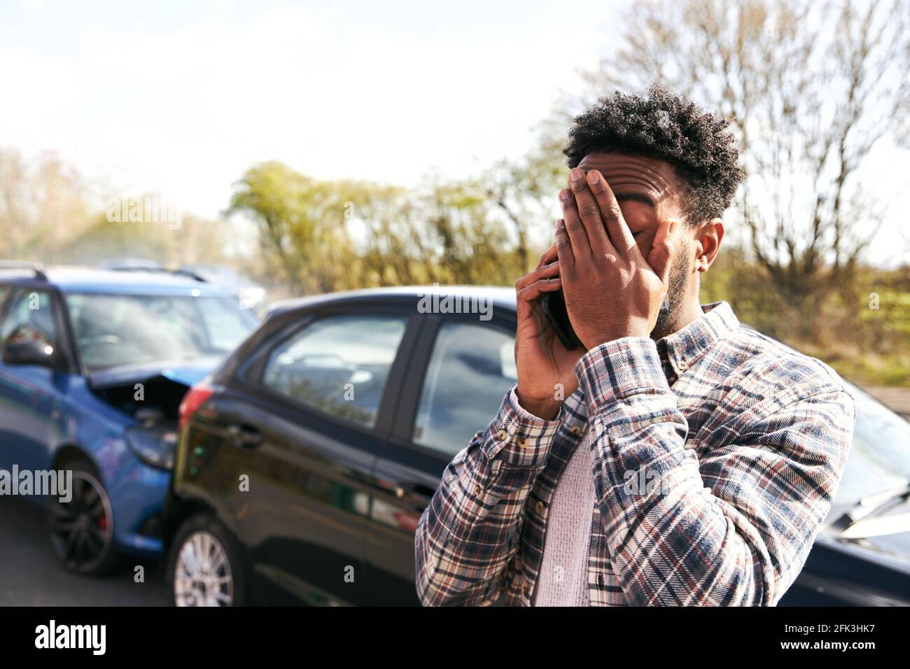 Man car wreck mobile phone hi-res stock photography and images - Alamy