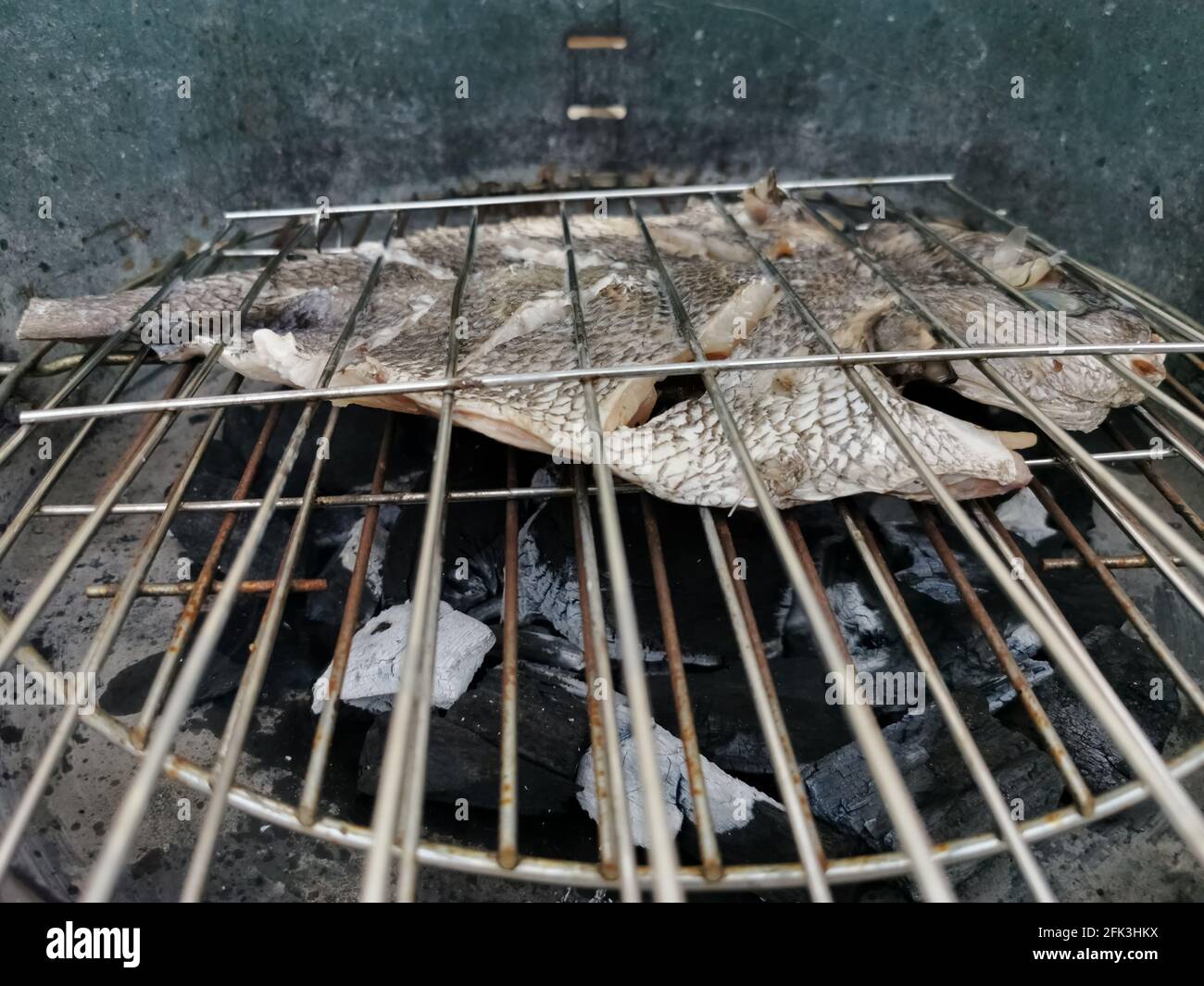 Animal cooked over a fire hi-res stock photography and images - Alamy