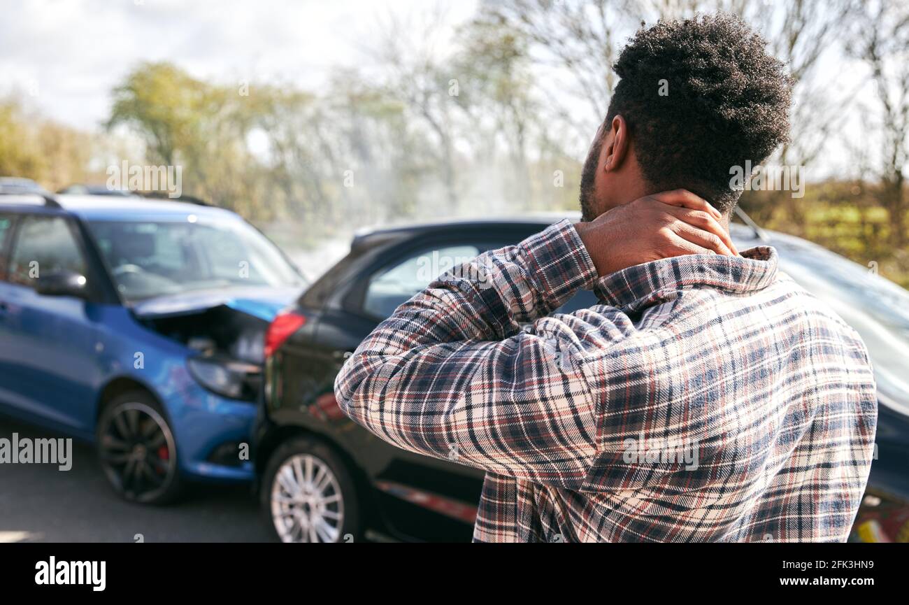 Man standing behind car hi-res stock photography and images - Alamy
