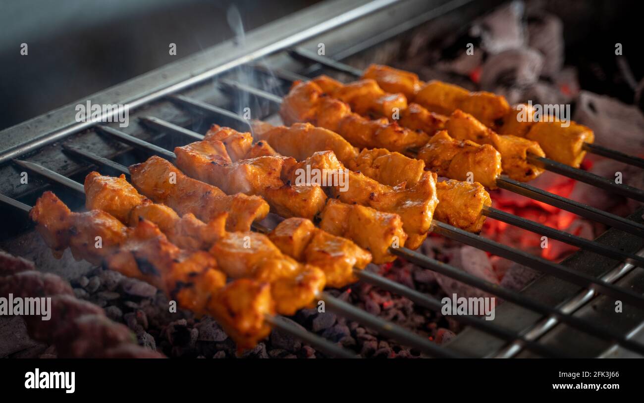 Arabic traditional food Shish taouk on the grill. traditional food ...