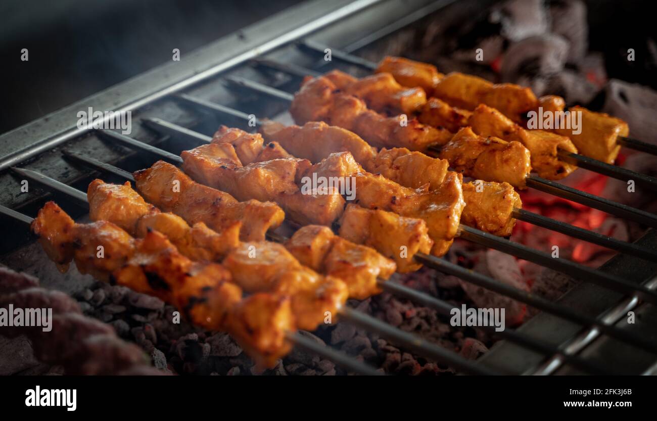 Arabic traditional food Shish taouk on the grill. traditional food ...