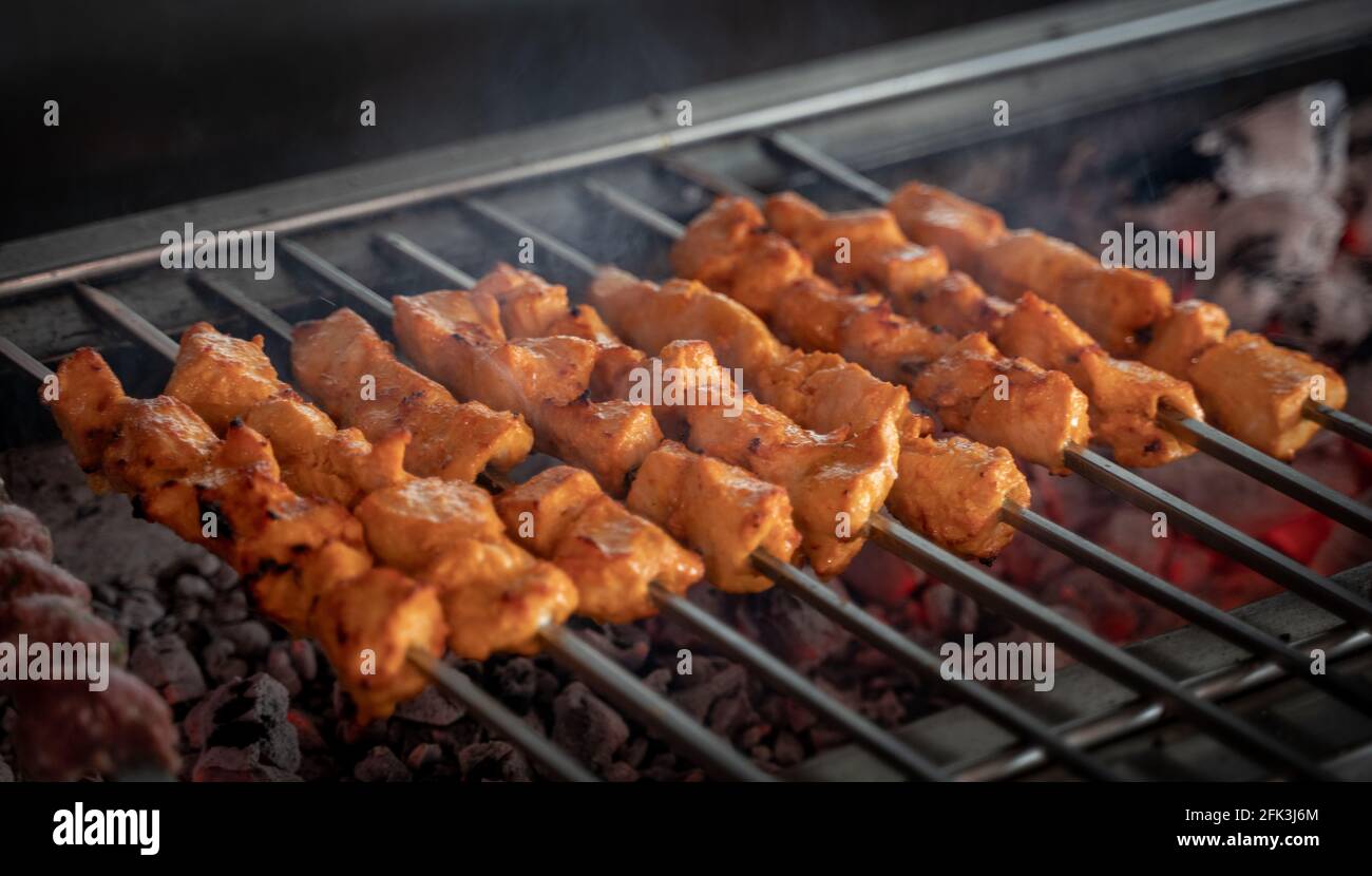 Arabic traditional food Shish taouk on the grill. traditional food ...