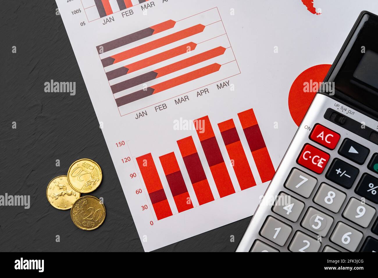 Financial paper with charts and diagrams on gray table Stock Photo - Alamy