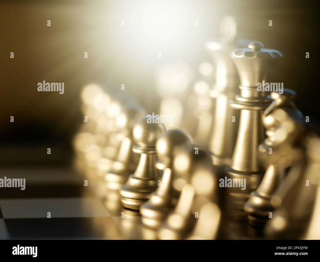 The chess golden pawn figure on a chessboard with a bright light ...