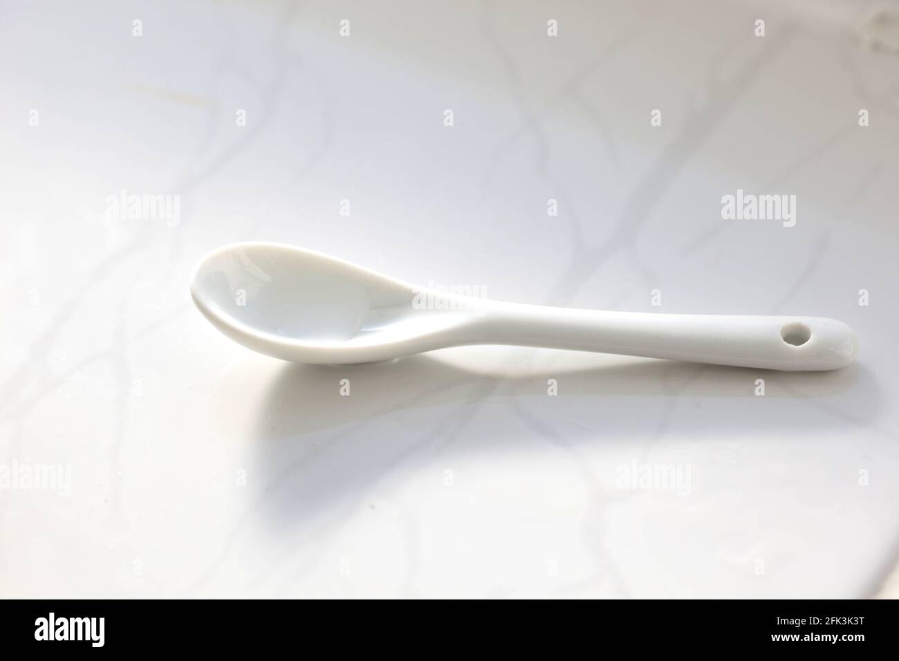 China spoon hi-res stock photography and images - Alamy