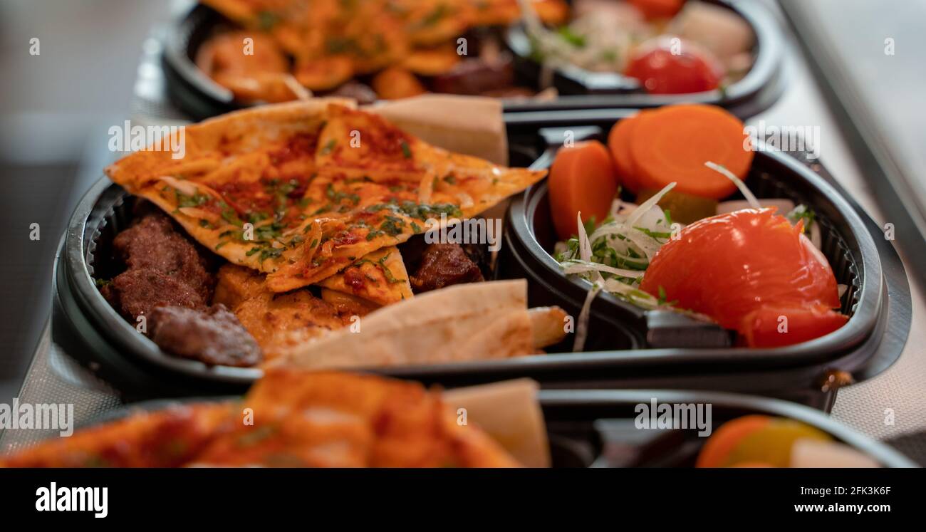 Arabic traditional mix bbq food on plastic container. arab traditional ...