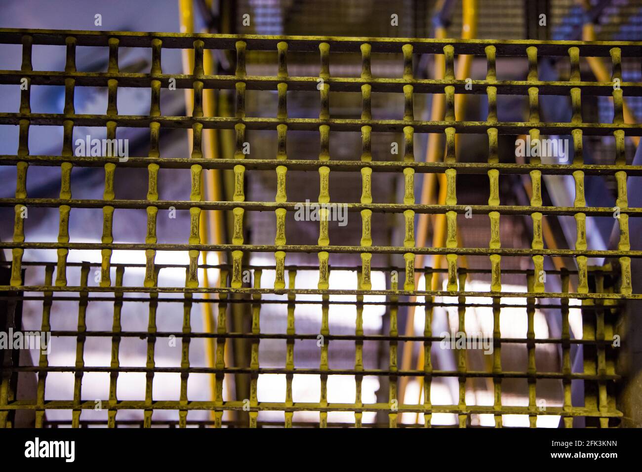 Steel grid floor on factory. Close-up photo Stock Photo - Alamy