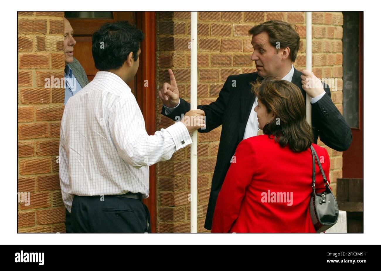 Alan Milburn Knocking on doors in Watford with Clair Ward (in Red ...