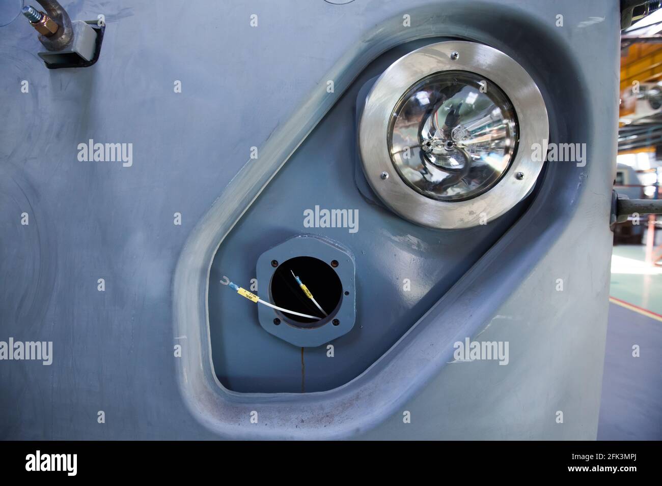 Close up of modern locomotive parts. Headlight system with halogen bulb ...