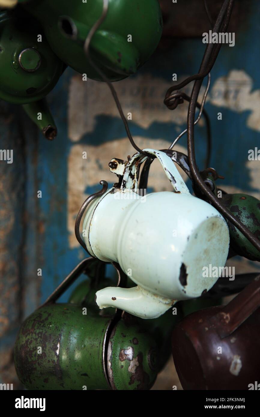 Hanging tea kettles outside a traditional Pathan’s chai cafe in a ...