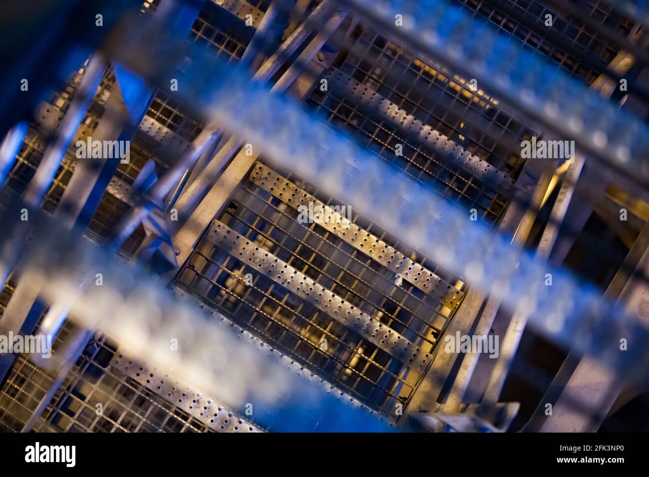 Metal grid stair. Oil refinery. Anti-slip qualities of the step. Safety ...
