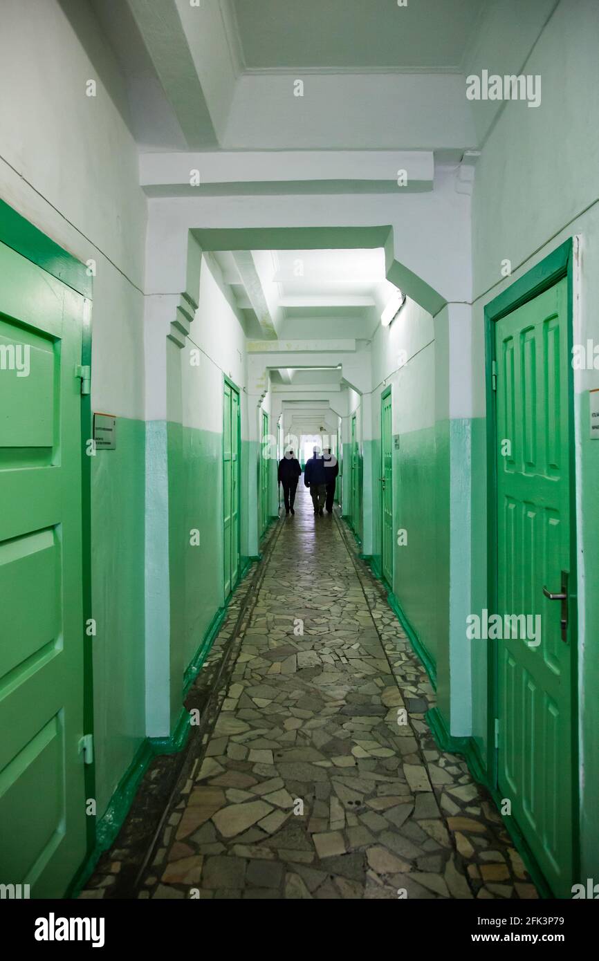 Classic Soviet industrial and office interior. Green painted wall ...