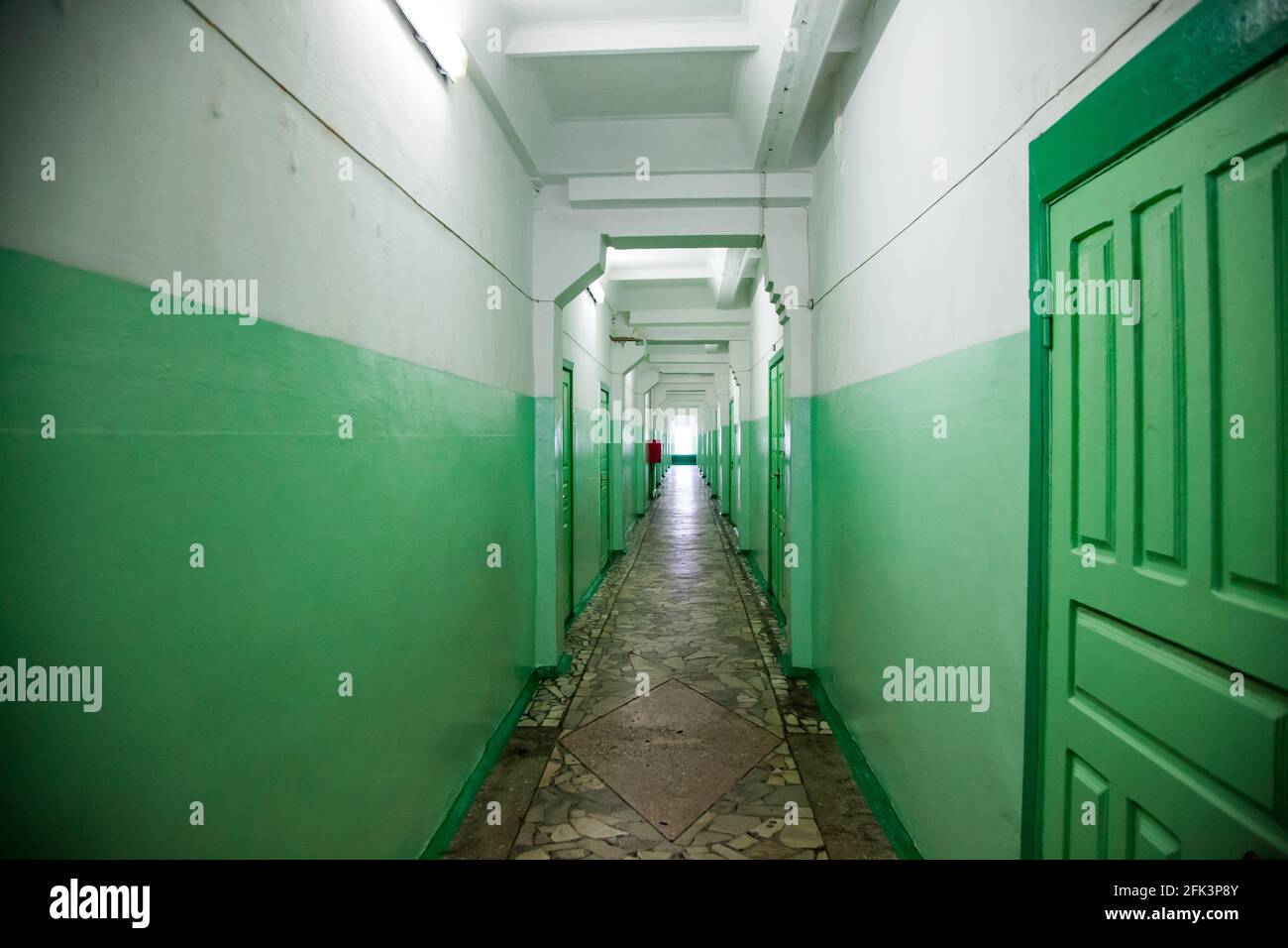 Classic Soviet industrial and office interior. Green painted wall ...