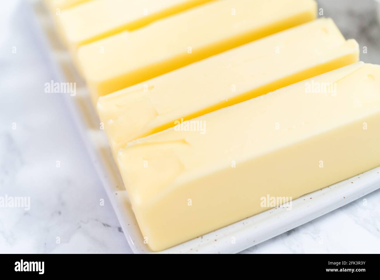 Sticks of butter at room temperature for baking Stock Photo - Alamy