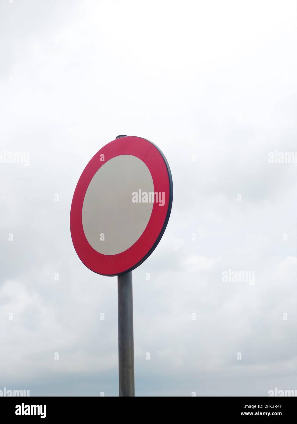 Blank prohibition sign under a nearly white sky Stock Photo - Alamy