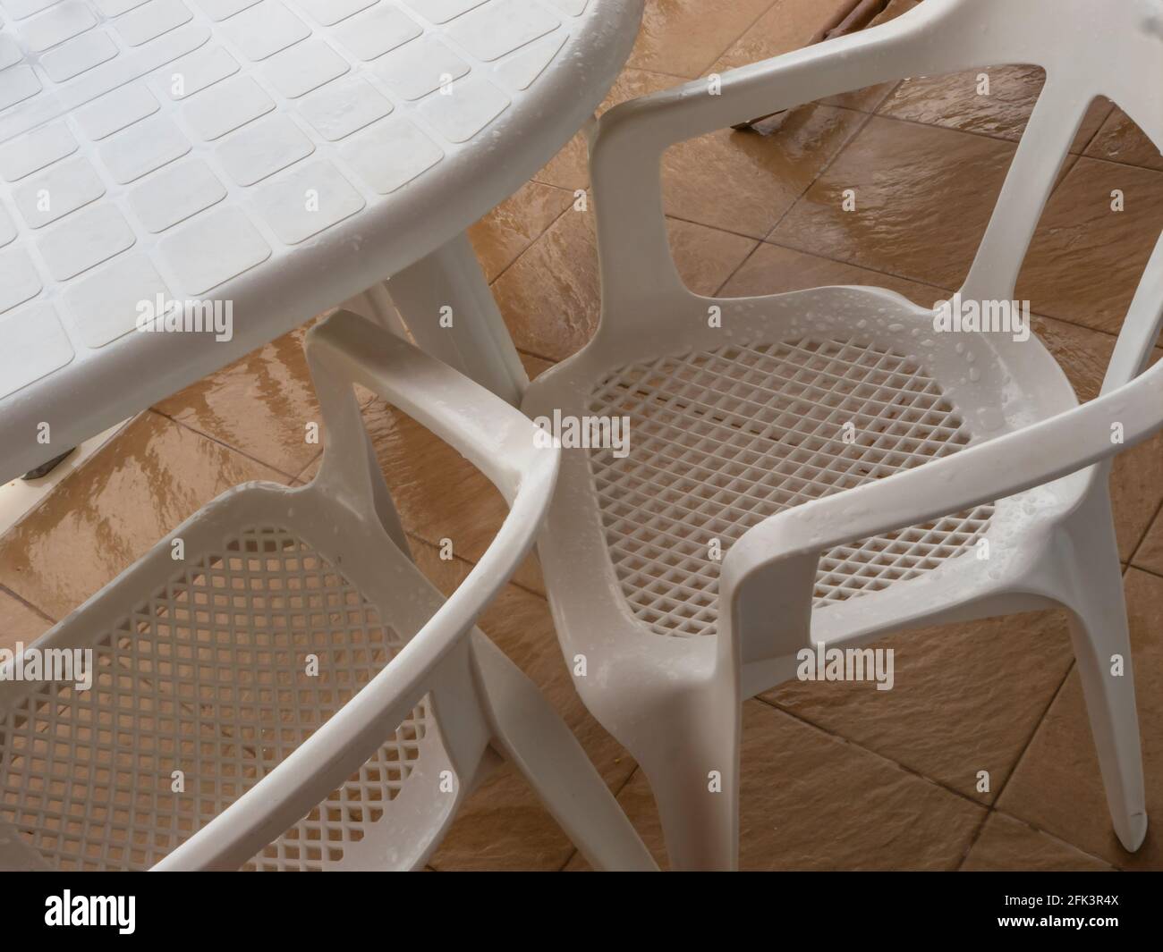 Wet chairs and table hi-res stock photography and images - Alamy