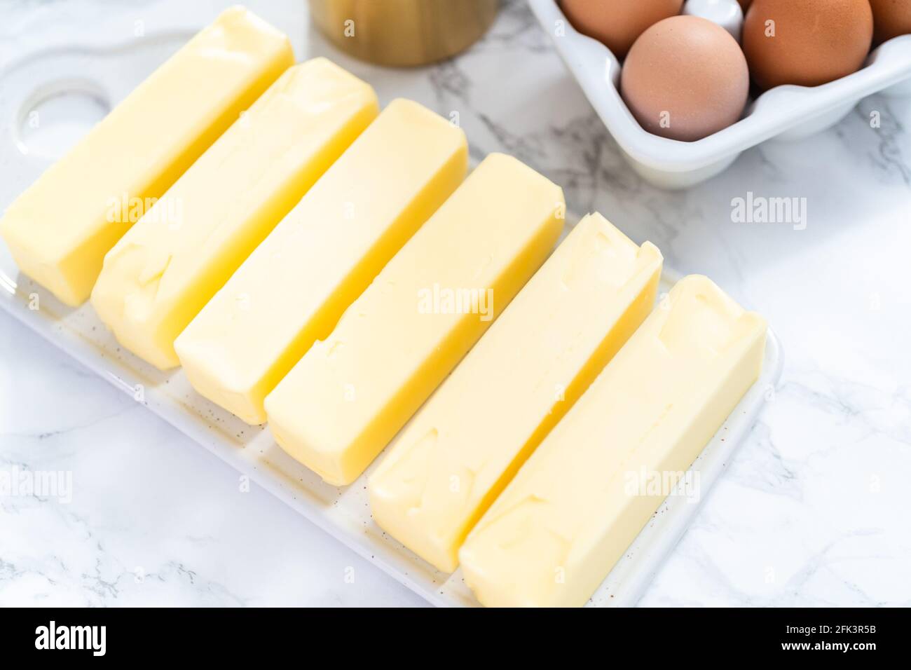 Sticks of butter at room temperature for baking Stock Photo - Alamy