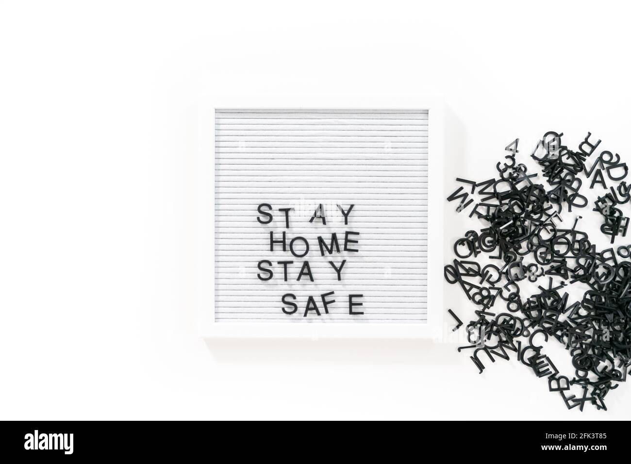 STAY HOME and STAY SAFE sign on message board Stock Photo - Alamy