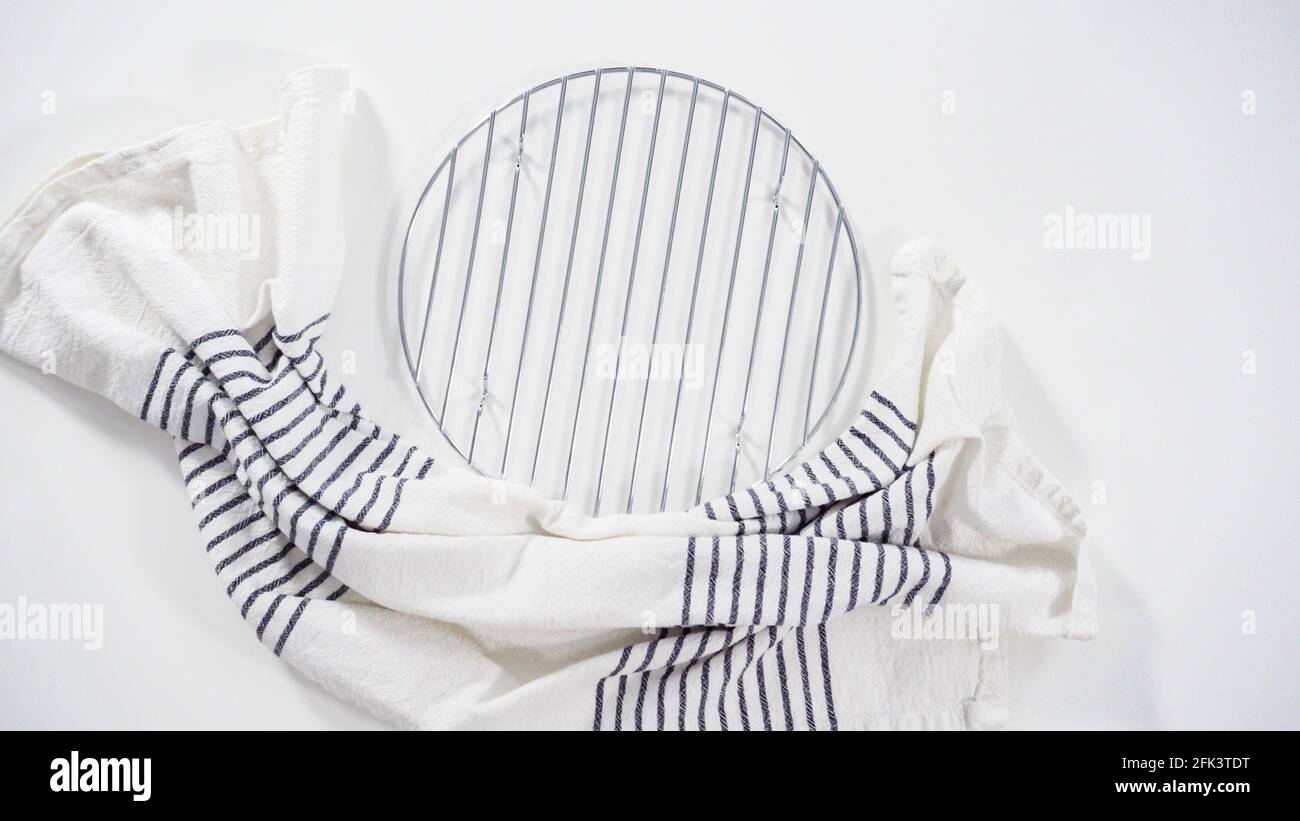 Flat lay. White and black kitchen towel on a white countertop Stock ...