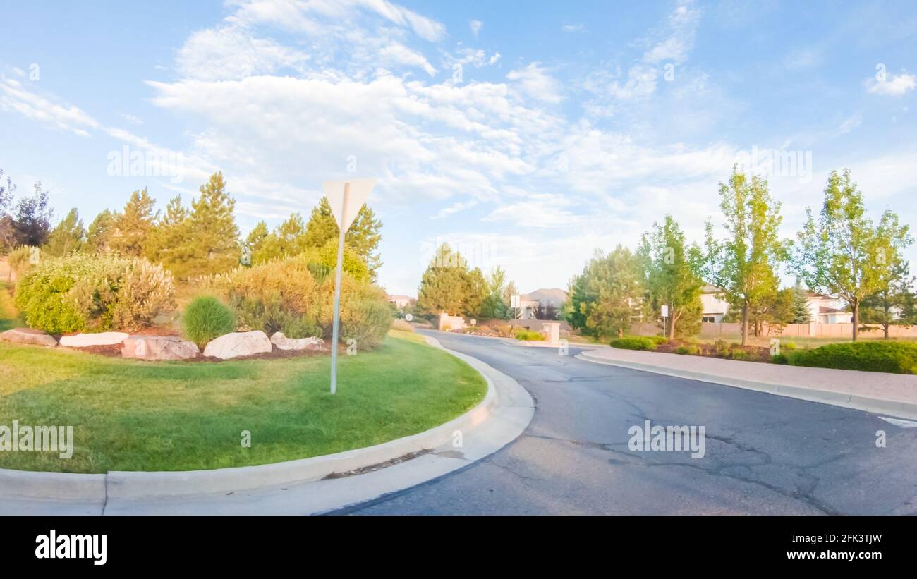 View of the typical suburban neighborhood on a summer morning Stock ...