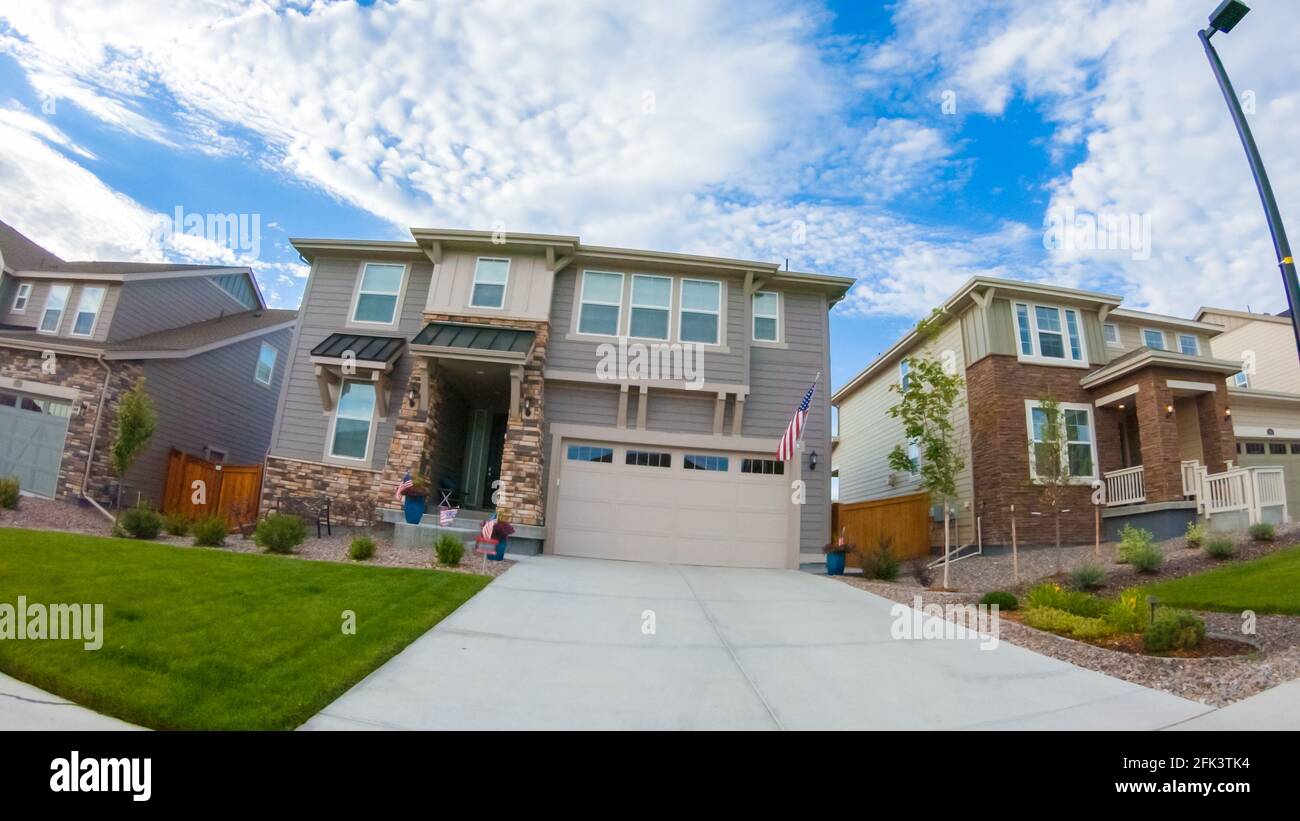 View of the typical suburban neighborhood on a summer morning Stock ...