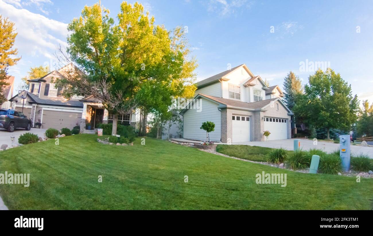 View of the typical suburban neighborhood on a summer morning Stock ...