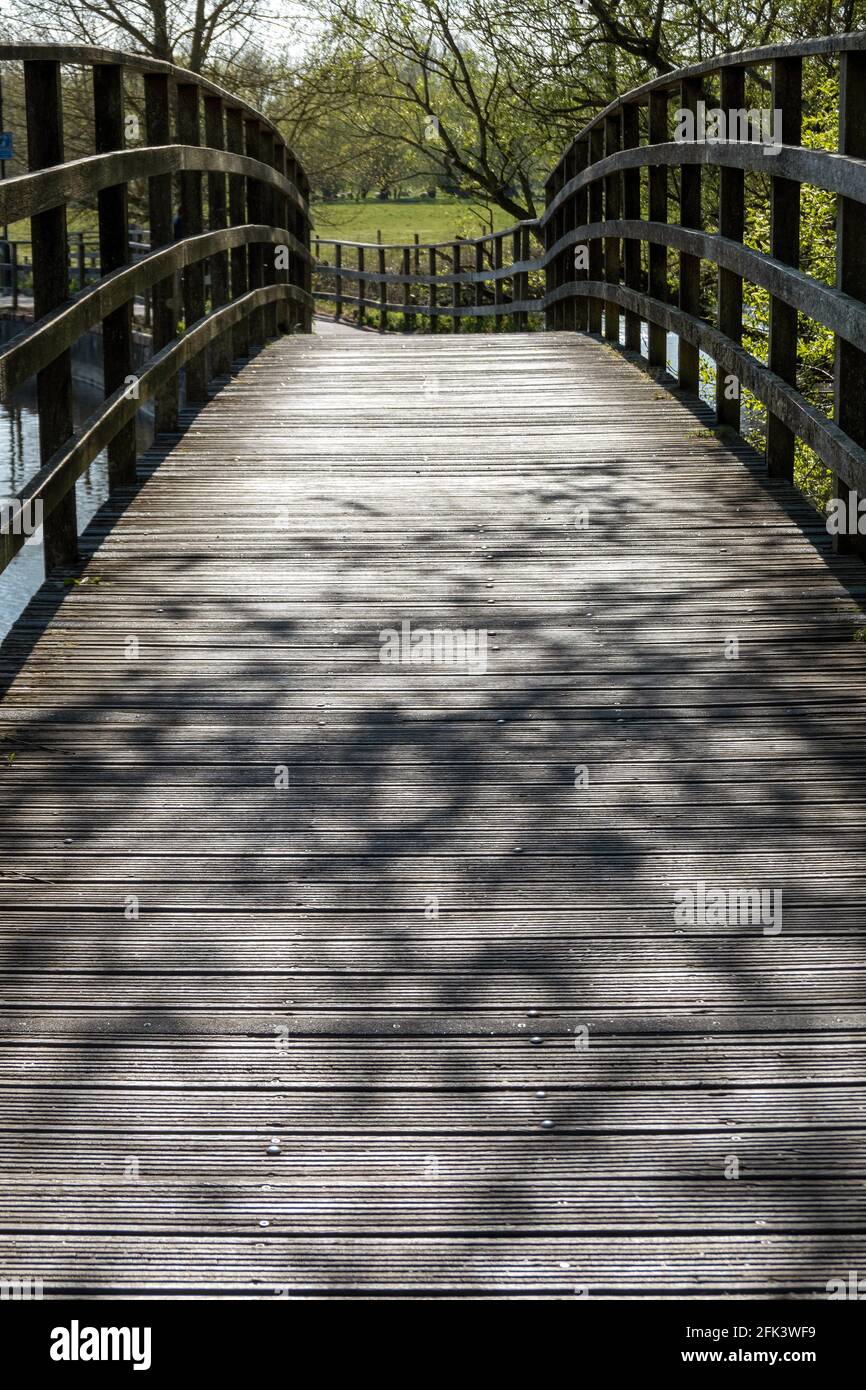 Salisbury, UK. 2021. Wooden footbridge for pedestrians and cyclists ...