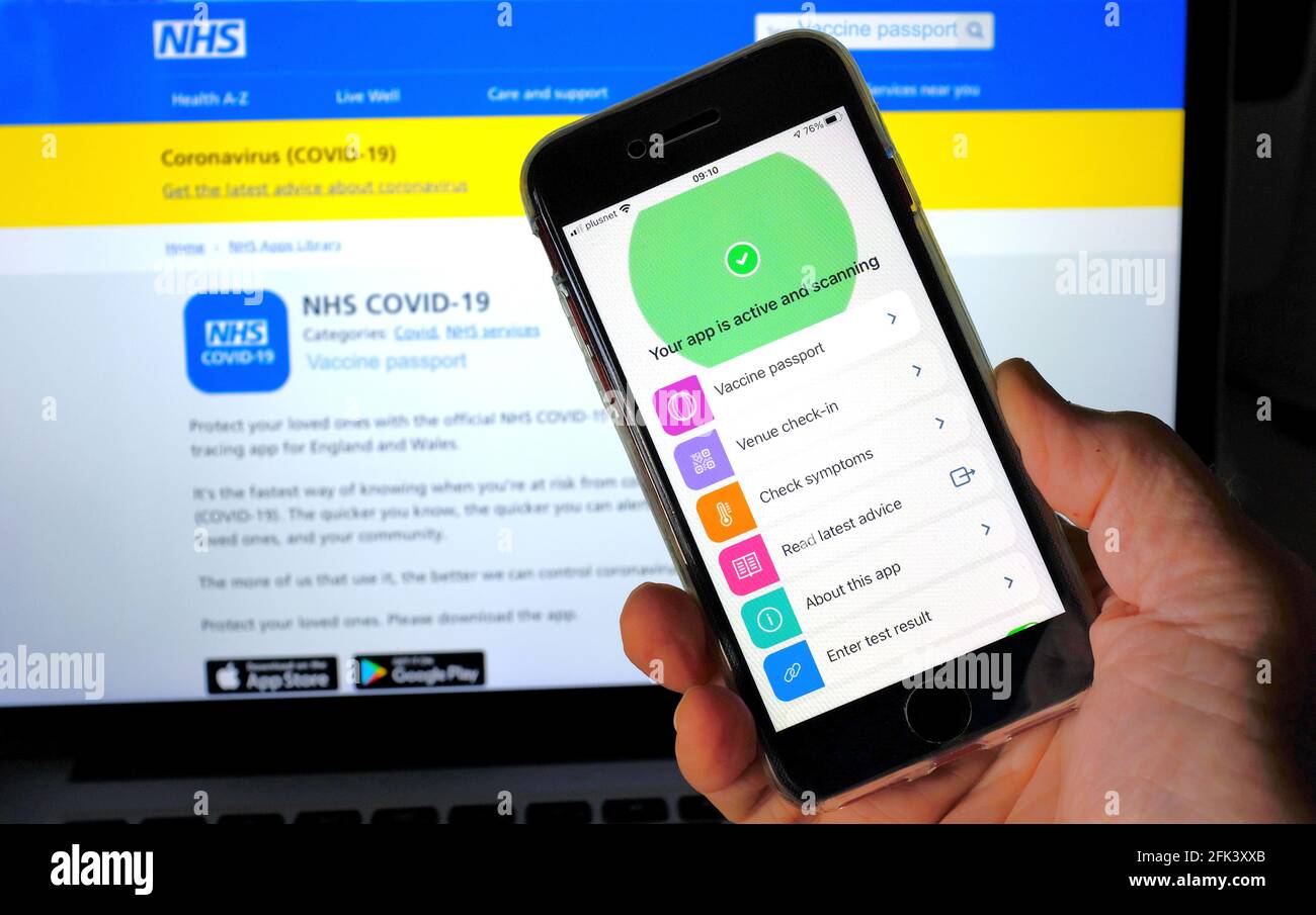 A mock-up of the NHS app with Vaccine passport update Stock Photo - Alamy