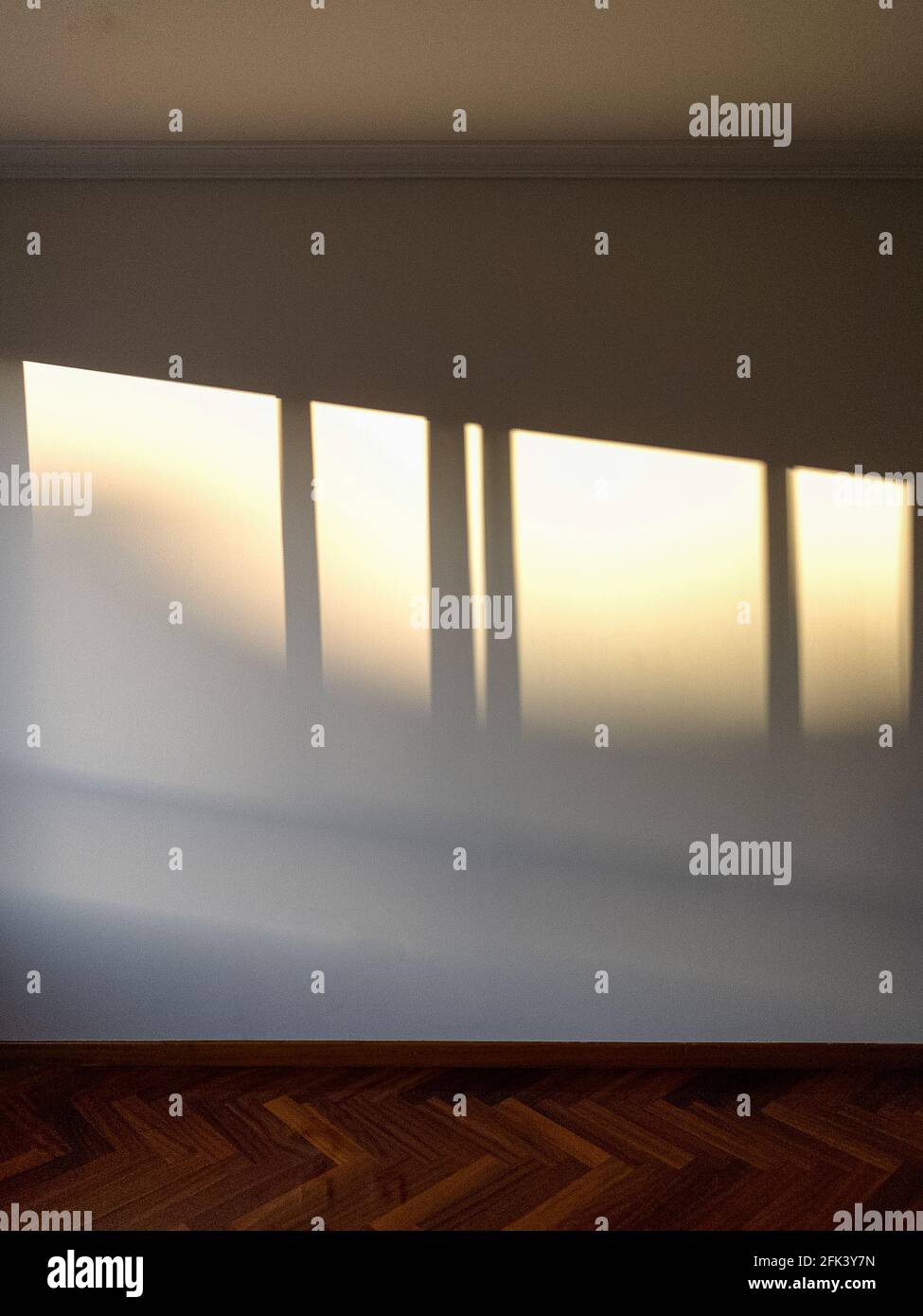 Sunlight through a window on an empty wall Stock Photo - Alamy