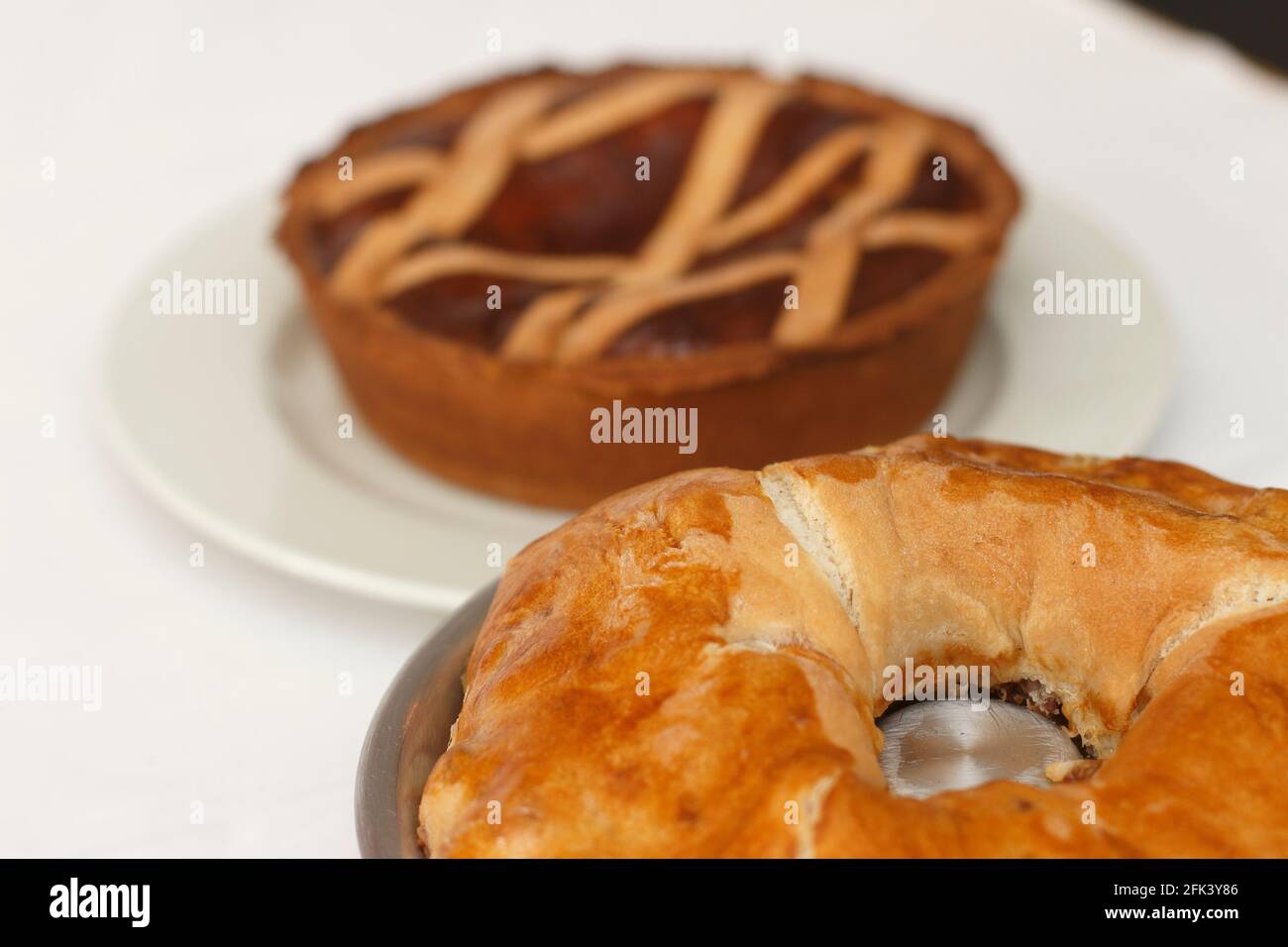 Close up on traditional italian food, tortano napoletano and pastiera ...