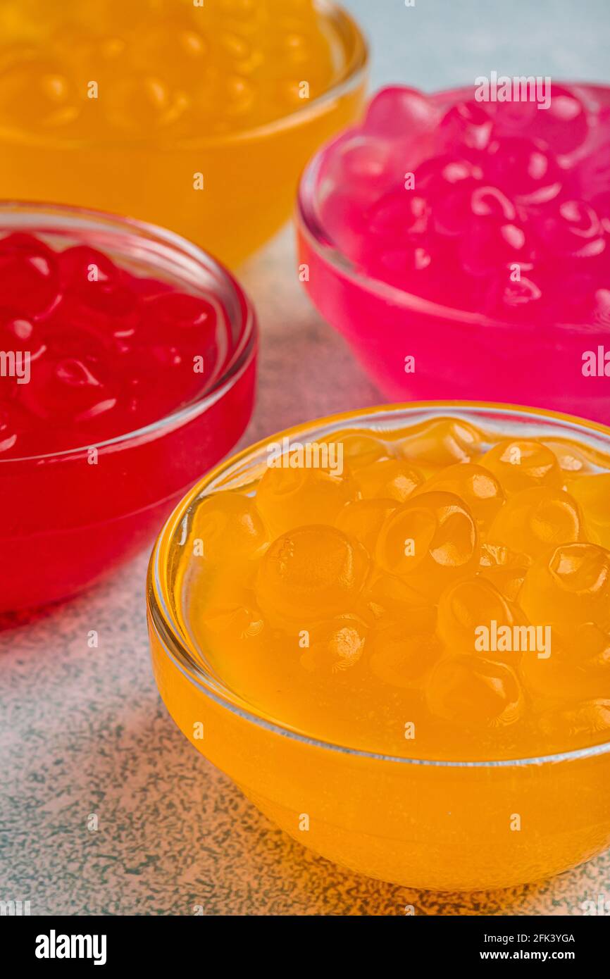 Different bowls of colorful tapioca pearl bubbles Stock Photo - Alamy