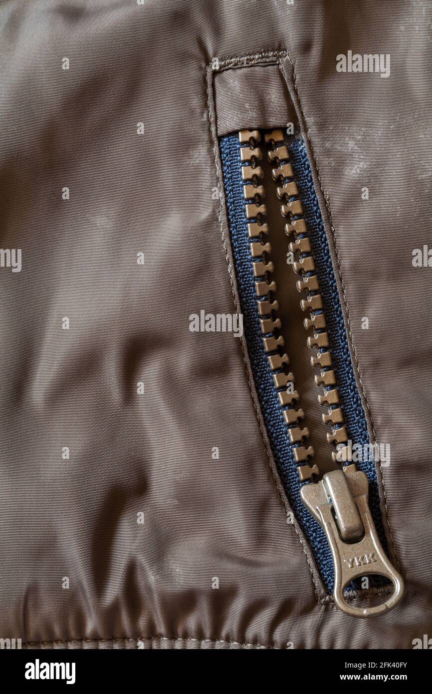 Undone zip hi-res stock photography and images - Alamy